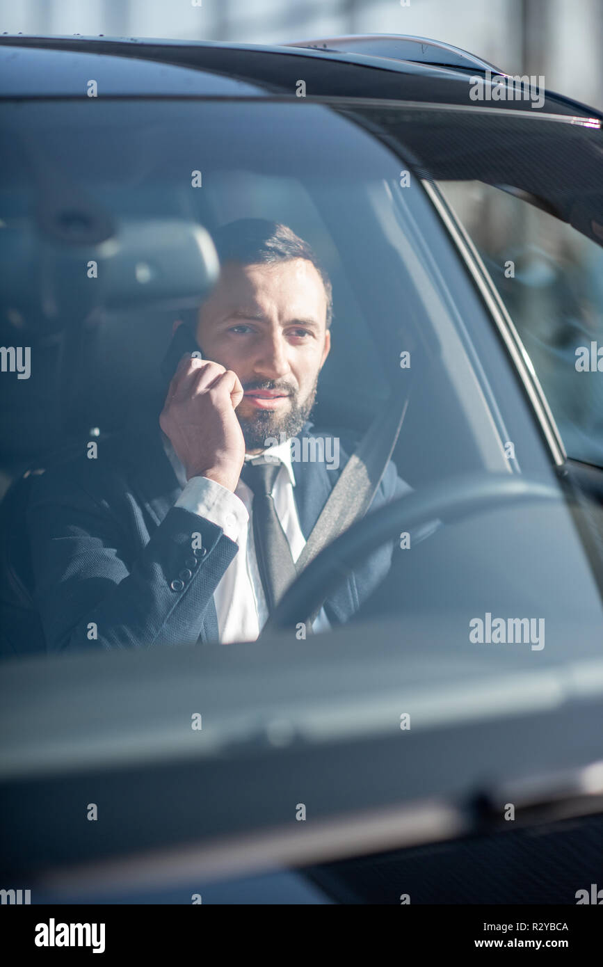 Man talking to driver through window hi-res stock photography and ...