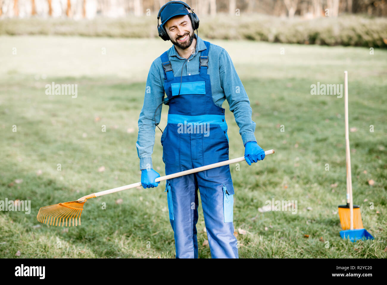 Professional gardener man working garden hi-res stock photography and ...