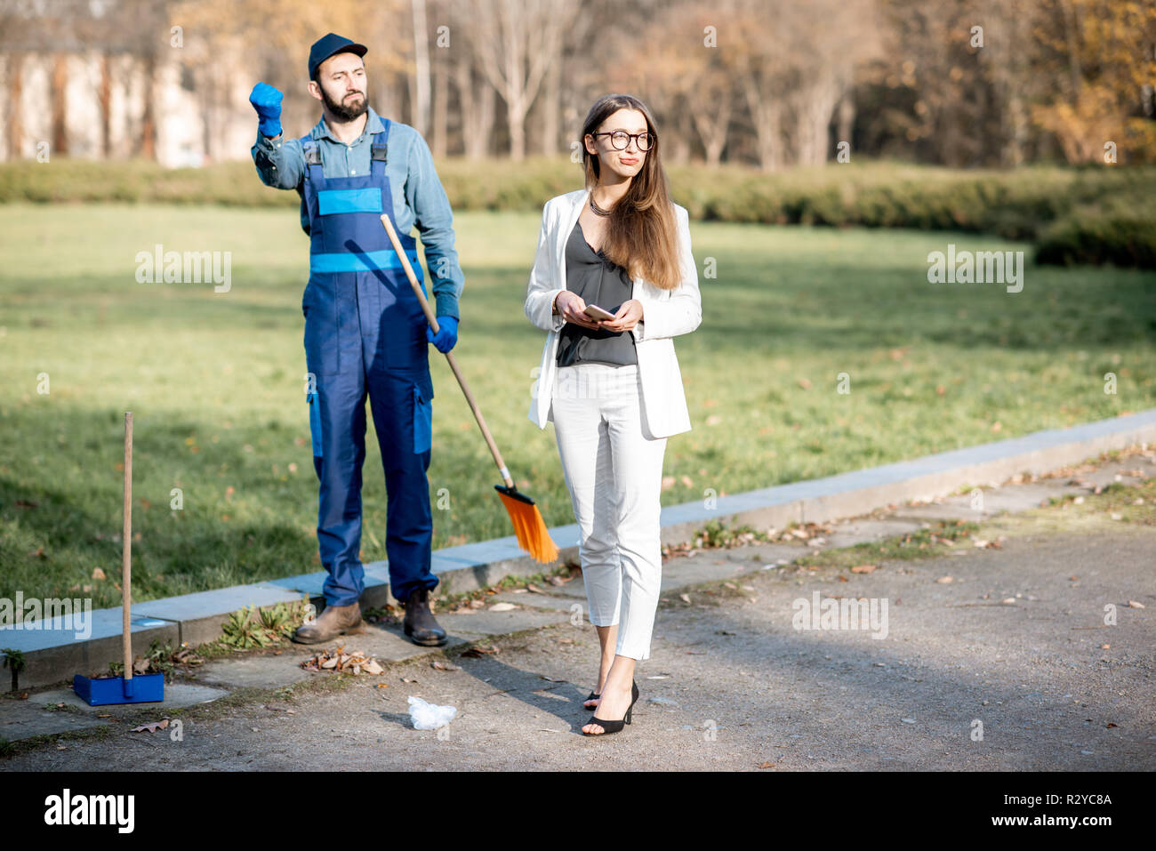Sweeping garbage hi-res stock photography and images - Alamy