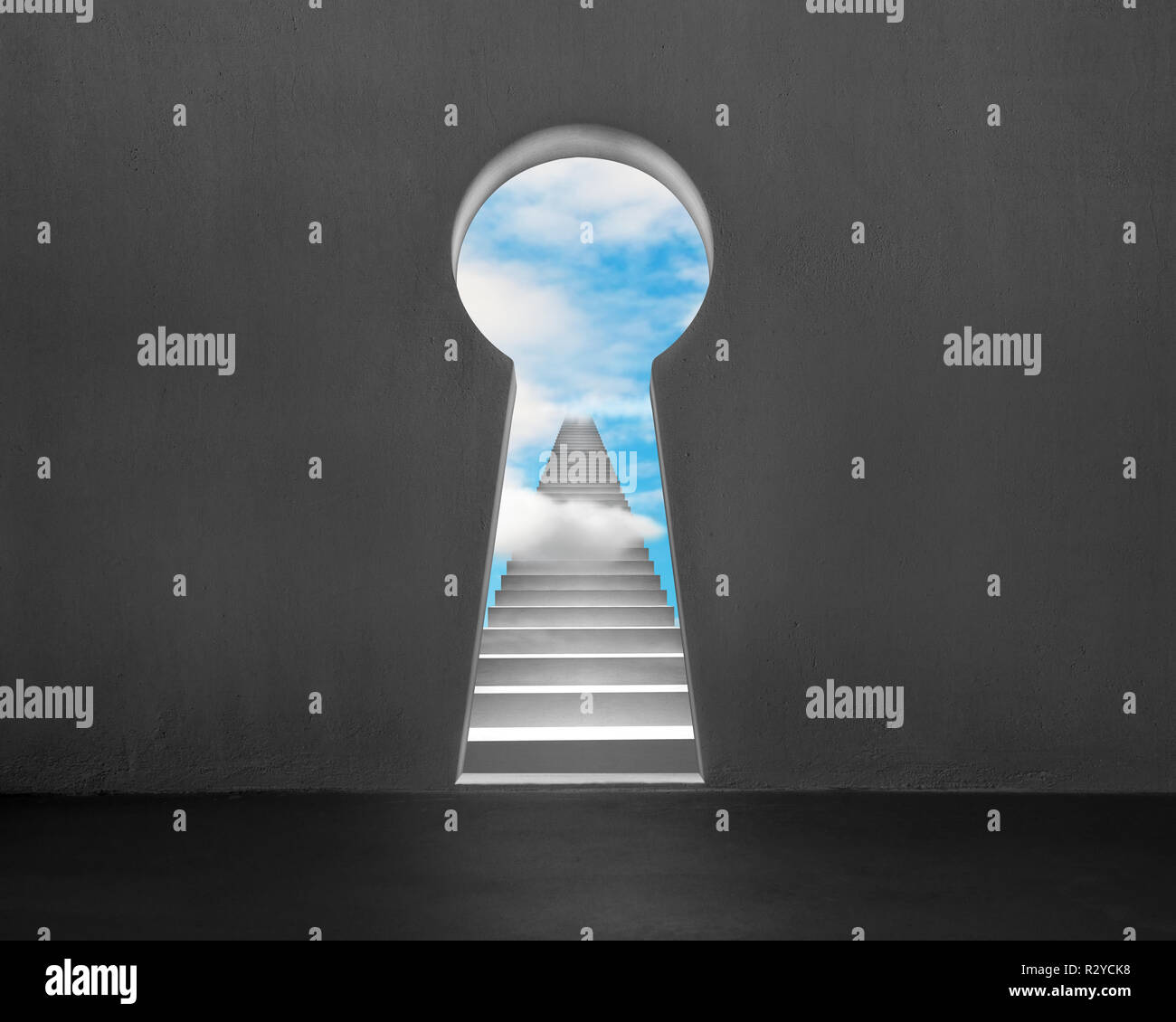 Key shape door on wall with concrete stairs and blue sky outside Stock ...