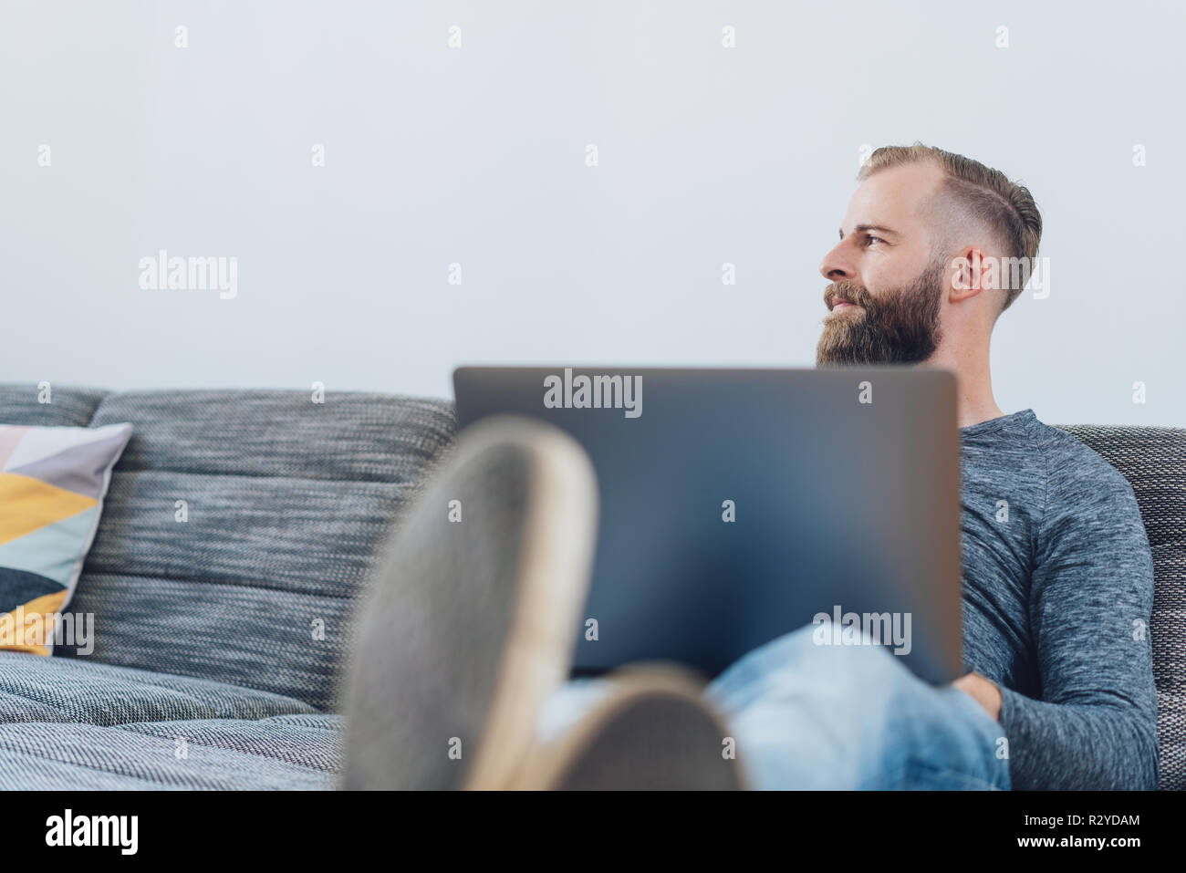 Man Feet Up Sofa High Resolution Stock Photography and Images - Alamy