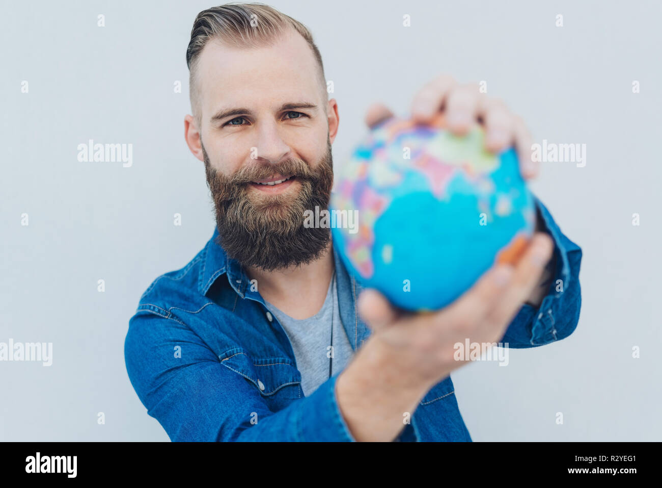Man holding globe hi-res stock photography and images - Alamy Man holding globe hi-res stock photography and images - Alamy