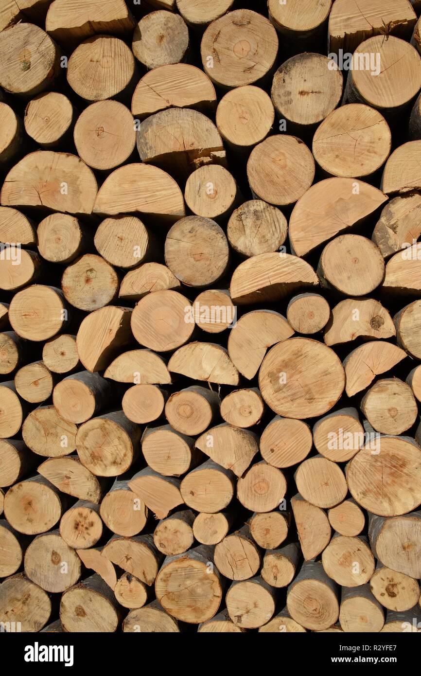 Cut wood on a pile ready for burning Stock Photo - Alamy