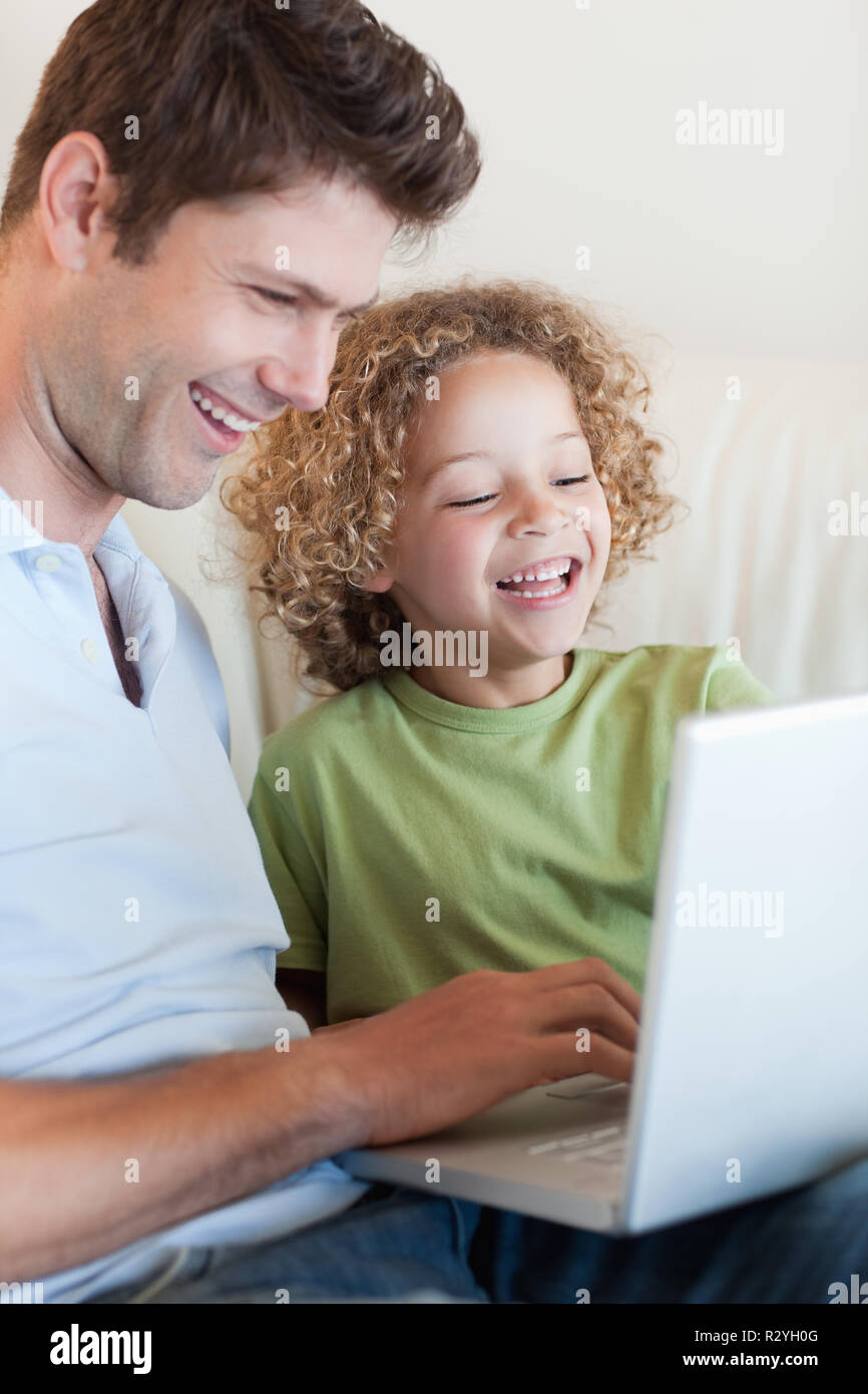 Father son using computers hi-res stock photography and images - Alamy