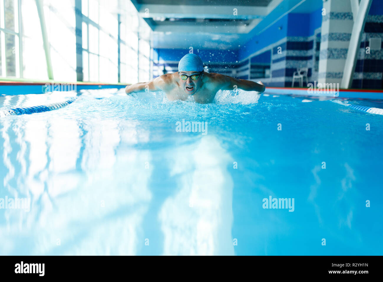 Handsome man swimming underwater in hi-res stock photography and images ...