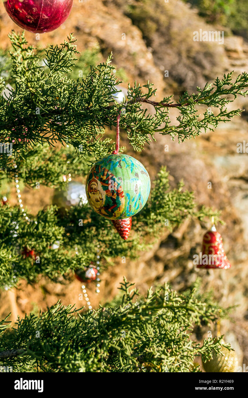 Decorated Christmas tree in the forest at nature background Stock Photo ...