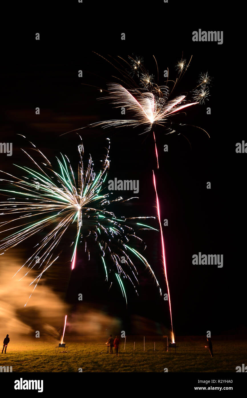 Long exposure of people letting off fireworks Stock Photo - Alamy