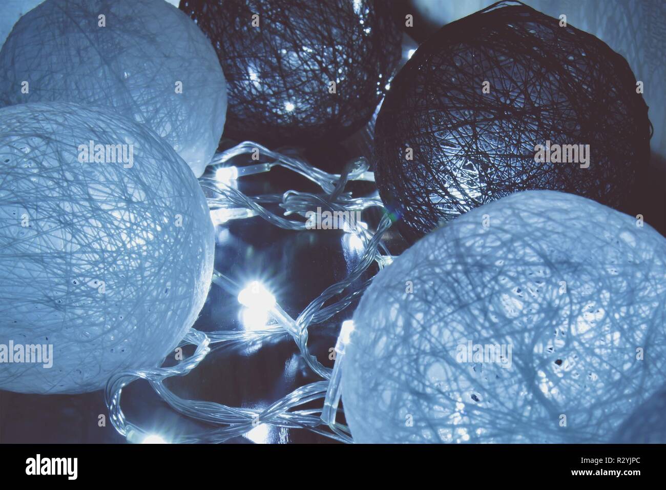New Year cold lights on a wooden table to be used as background Stock ...