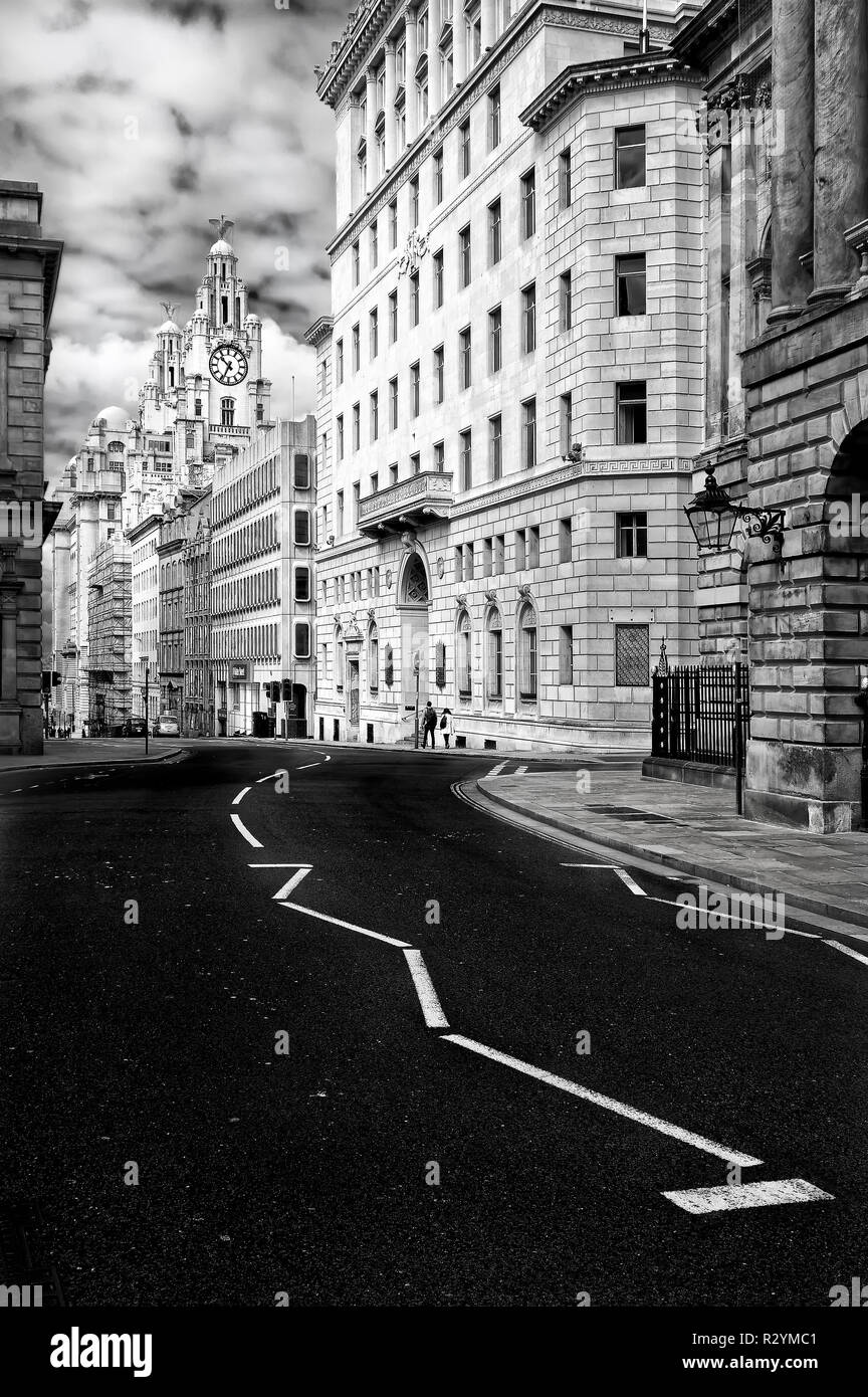 One of the streets of Liverpool with a view of the Liver Building and ...