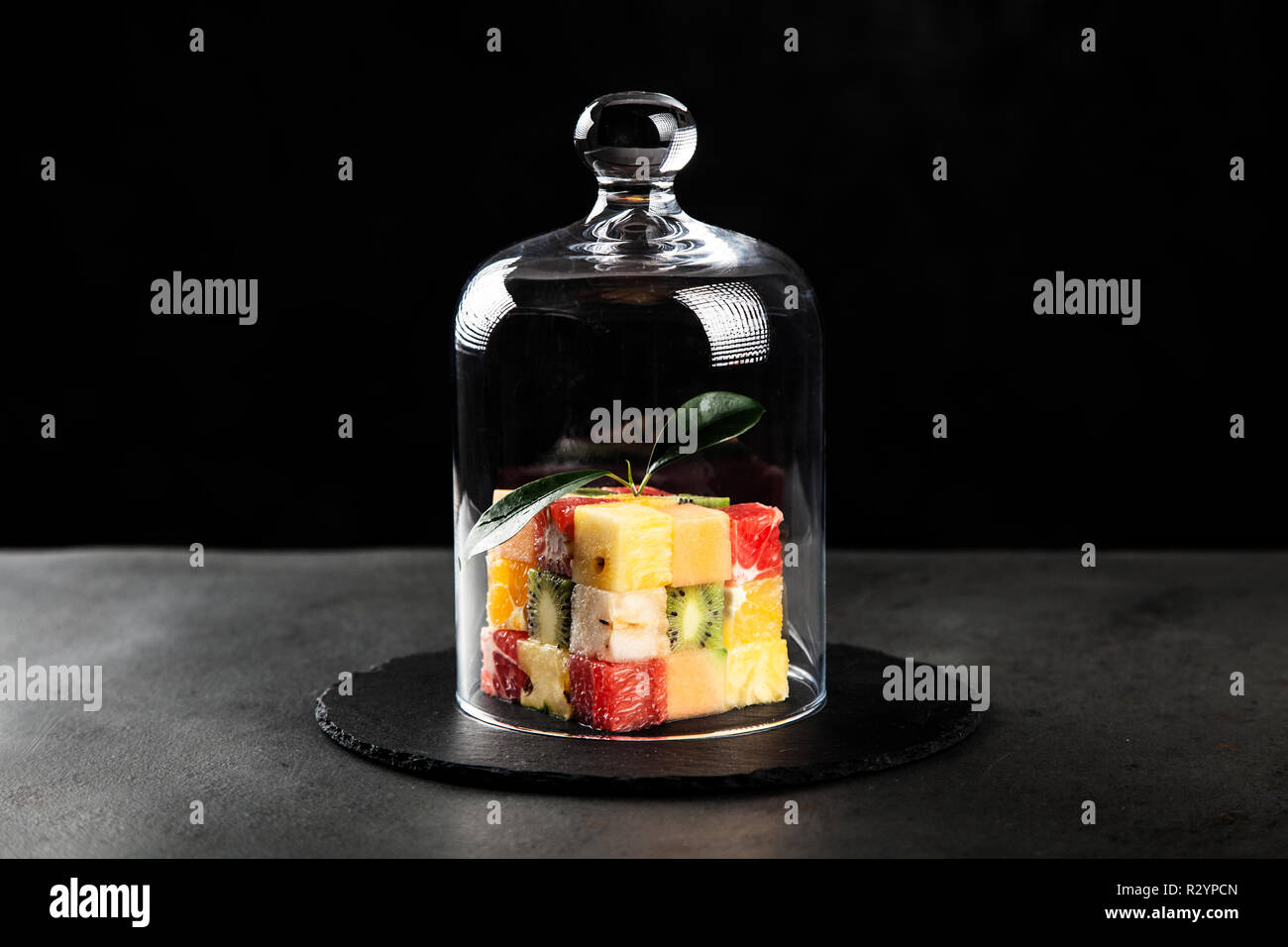 Fruit cube isolated on white background Stock Photo - Alamy