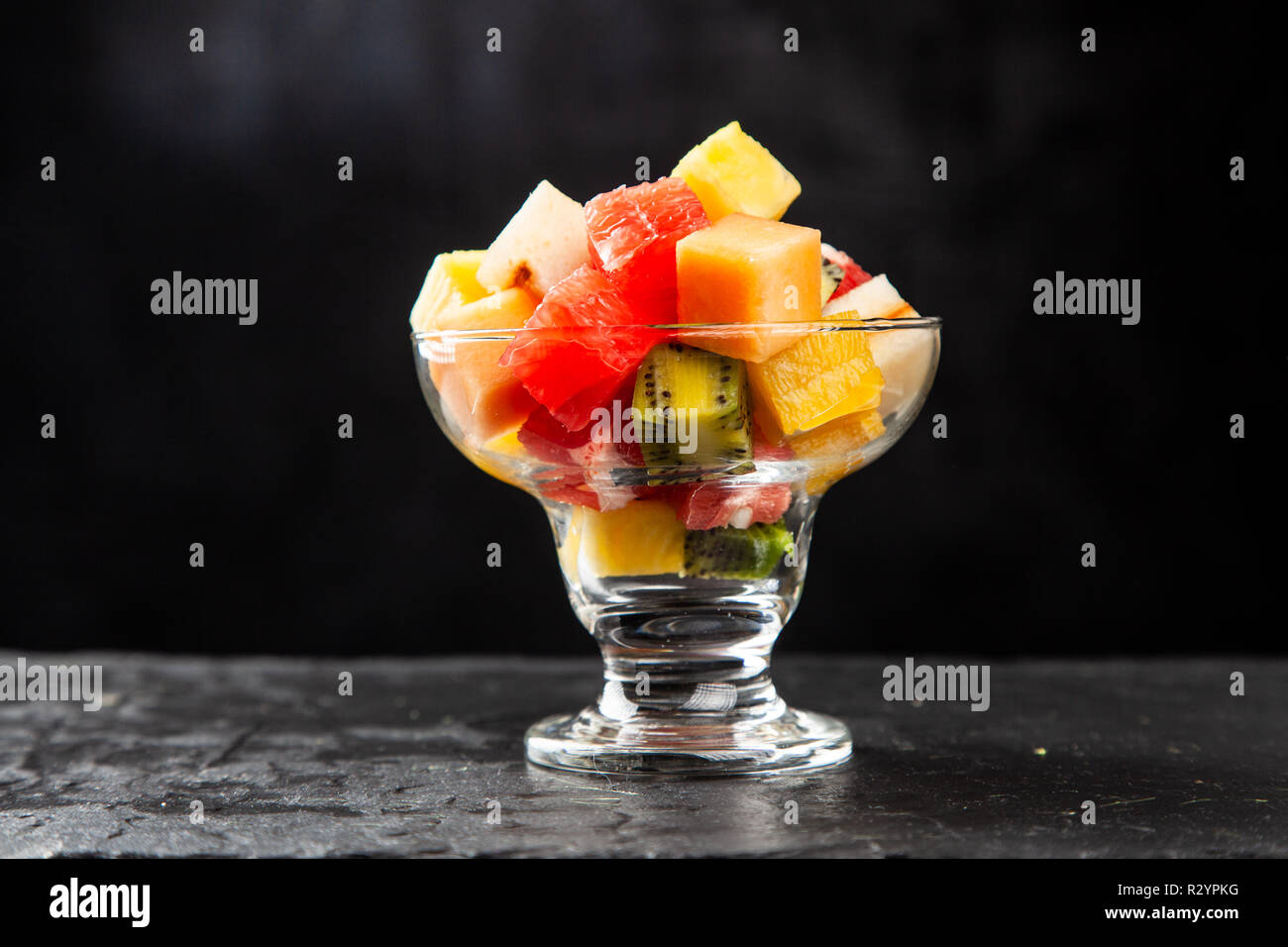 Fruit cube isolated on white background Stock Photo - Alamy