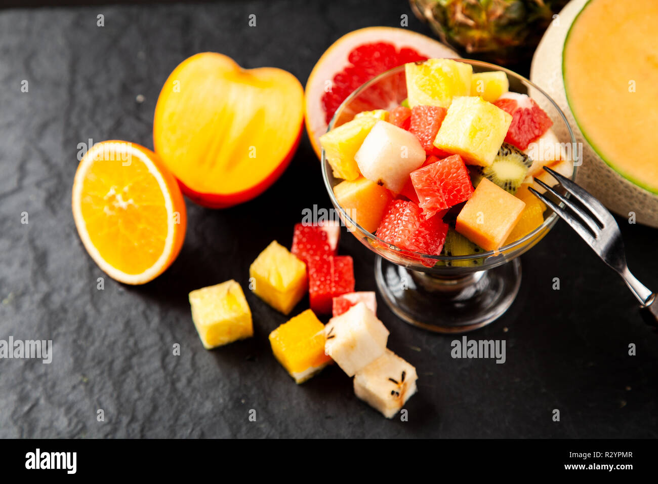 Fruit cube isolated on white background Stock Photo - Alamy