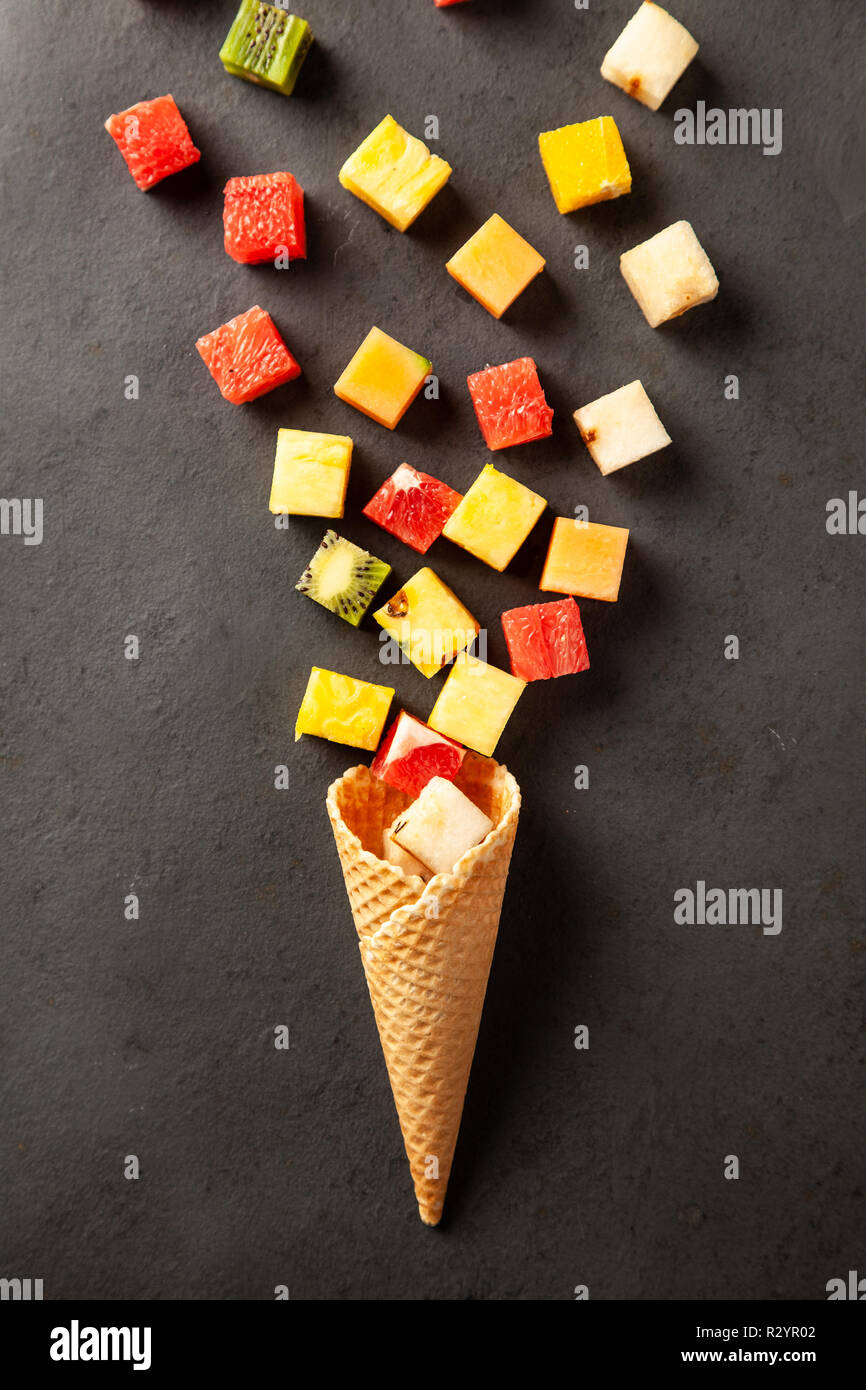 Fruit cube isolated on white background Stock Photo - Alamy