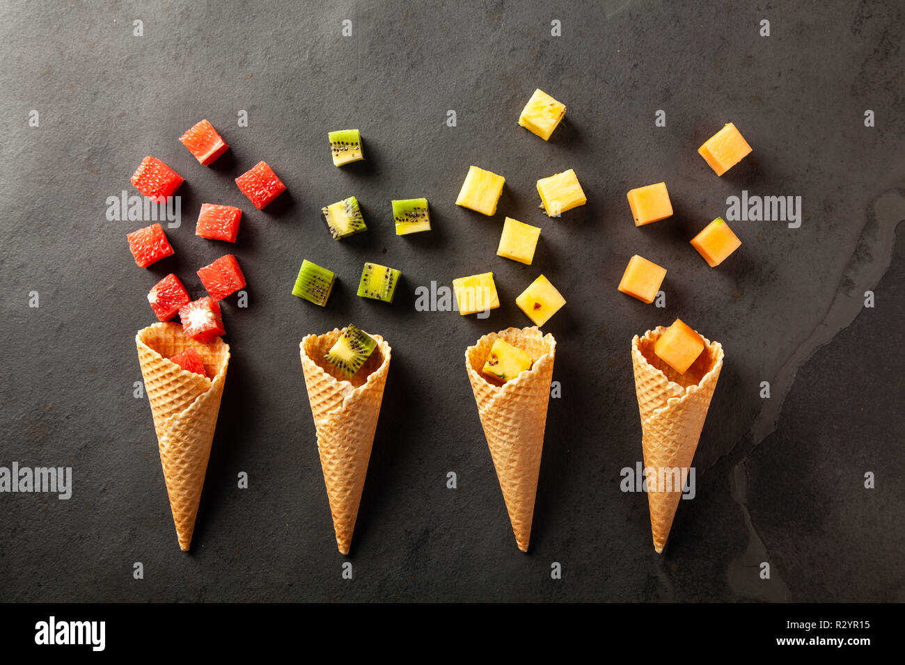 Fruit cube isolated on white background Stock Photo - Alamy