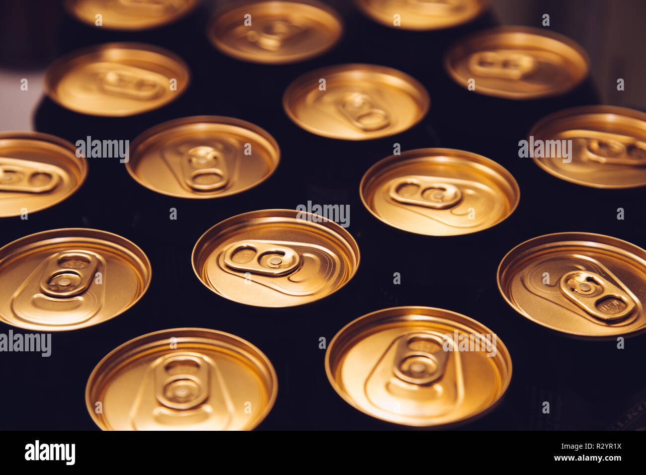 metal beer cans background black Stock Photo - Alamy