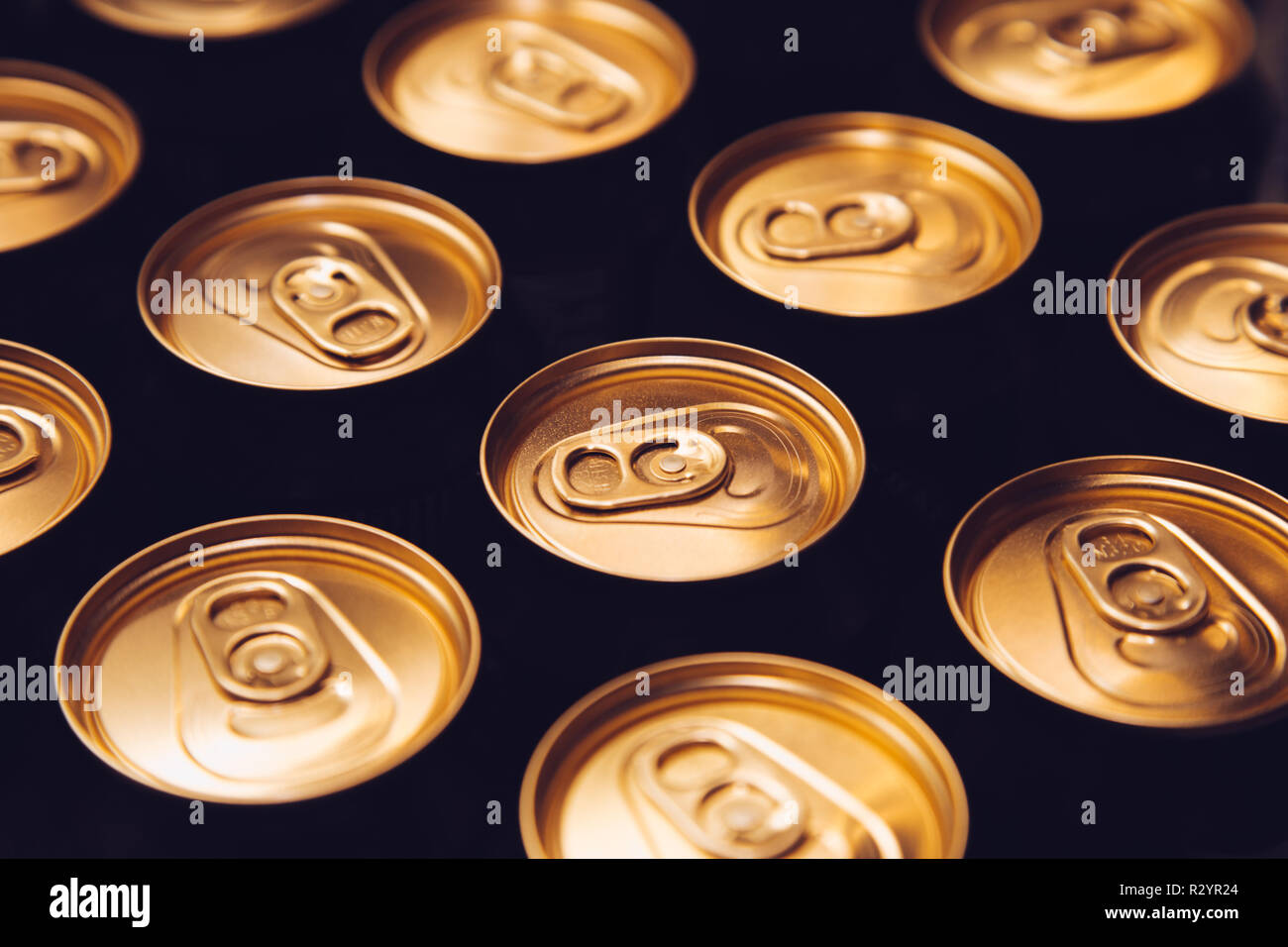 metal beer cans background black Stock Photo - Alamy