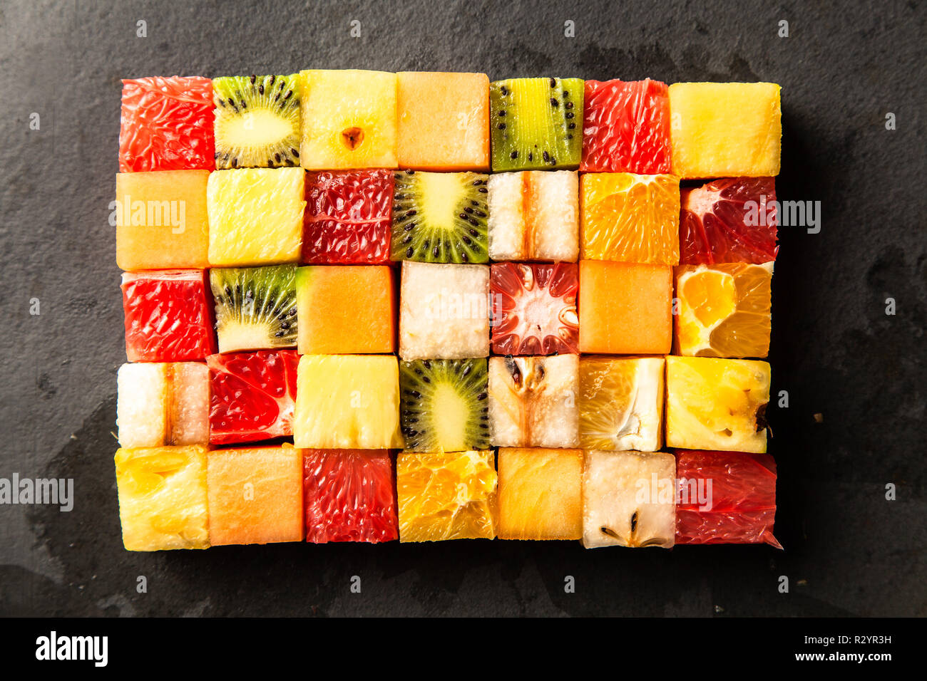 Fruit cube isolated on white background Stock Photo - Alamy