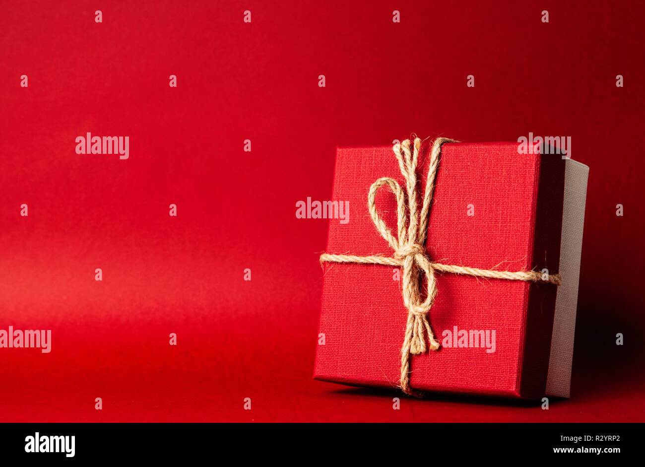 Gift boxes on red background Stock Photo - Alamy