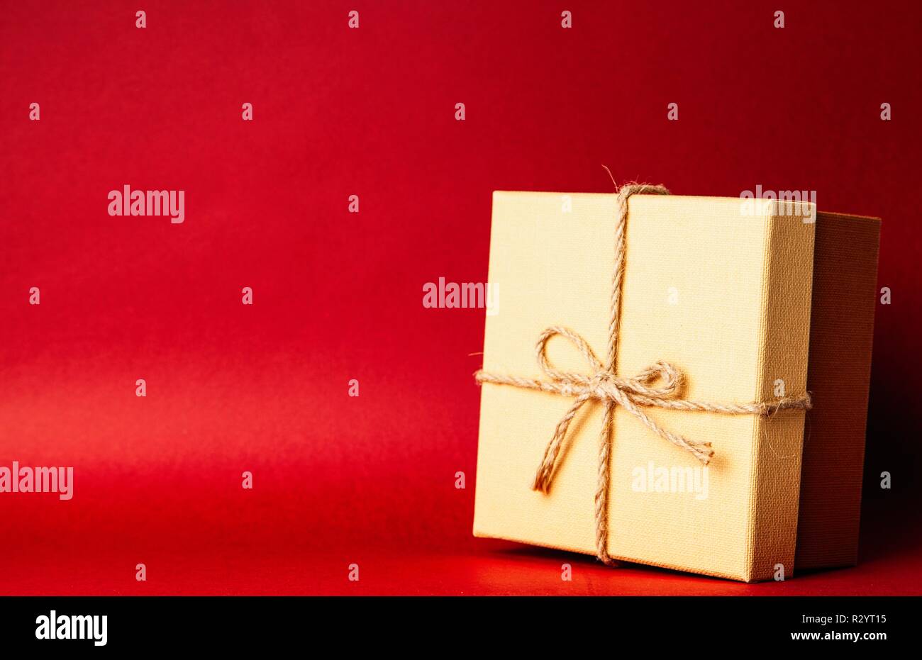 Gift boxes on red background Stock Photo - Alamy