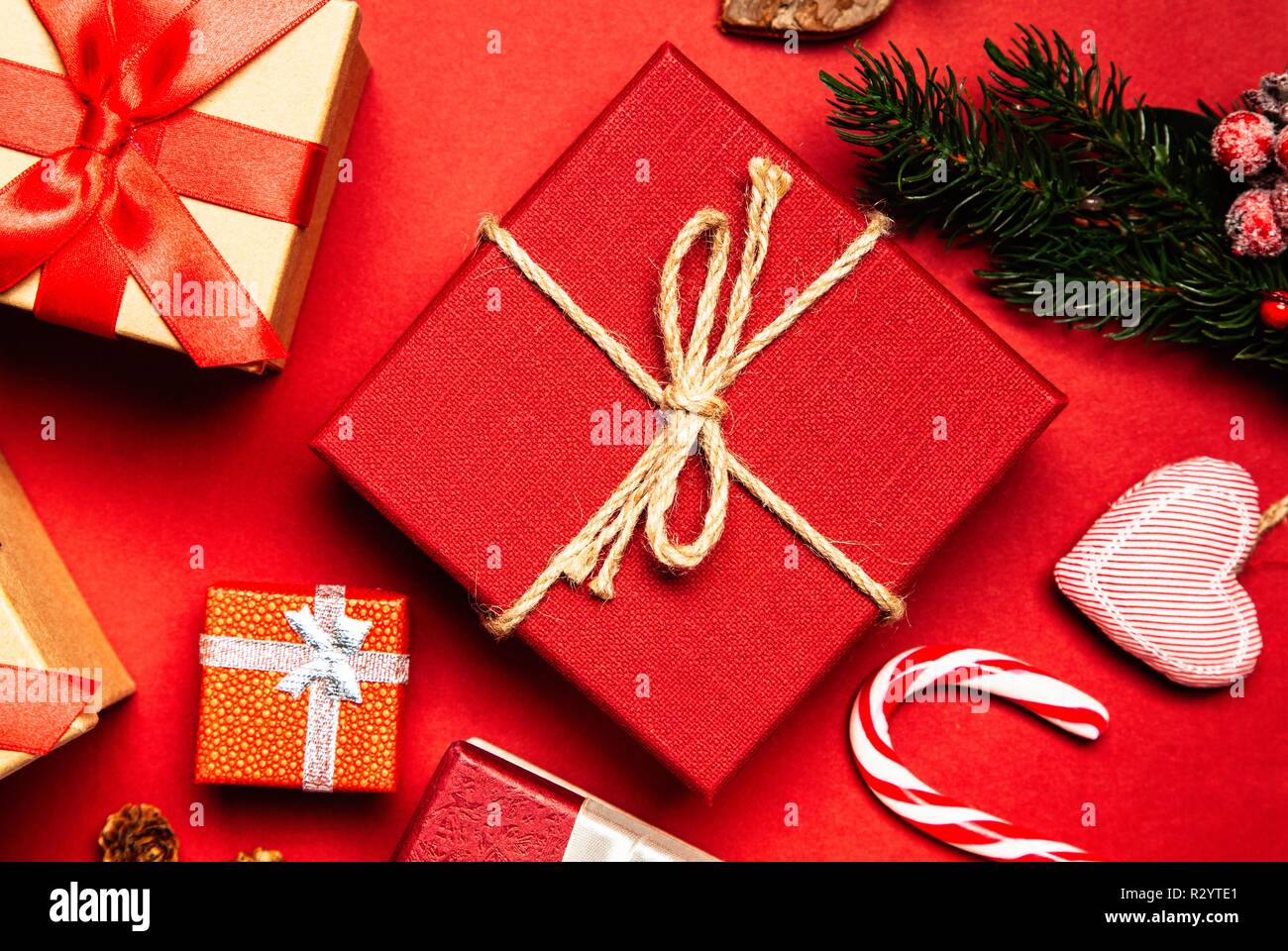 Gift boxes on red background Stock Photo - Alamy