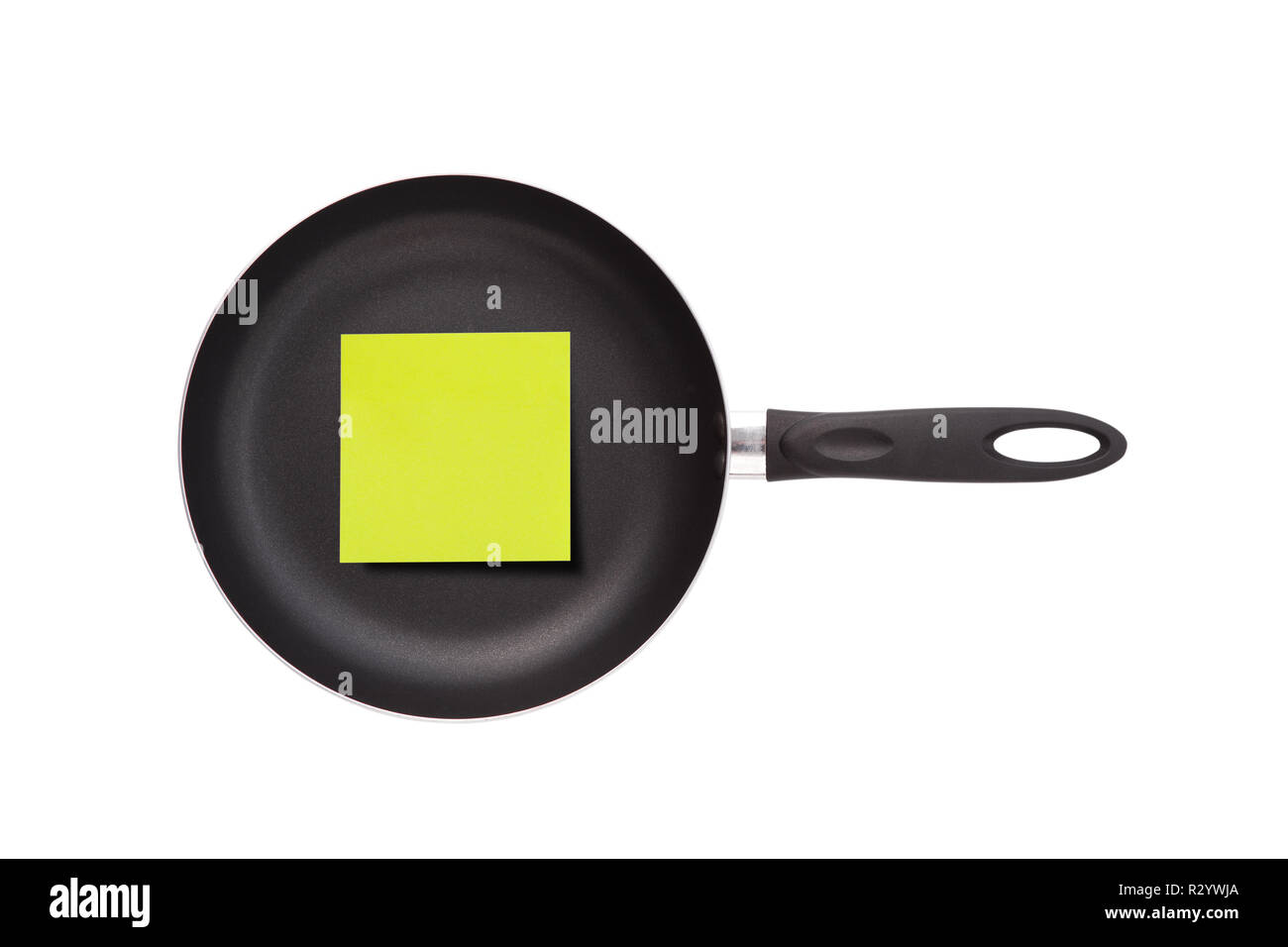 Stick note on frying pan isolated on white background. Top view Stock ...
