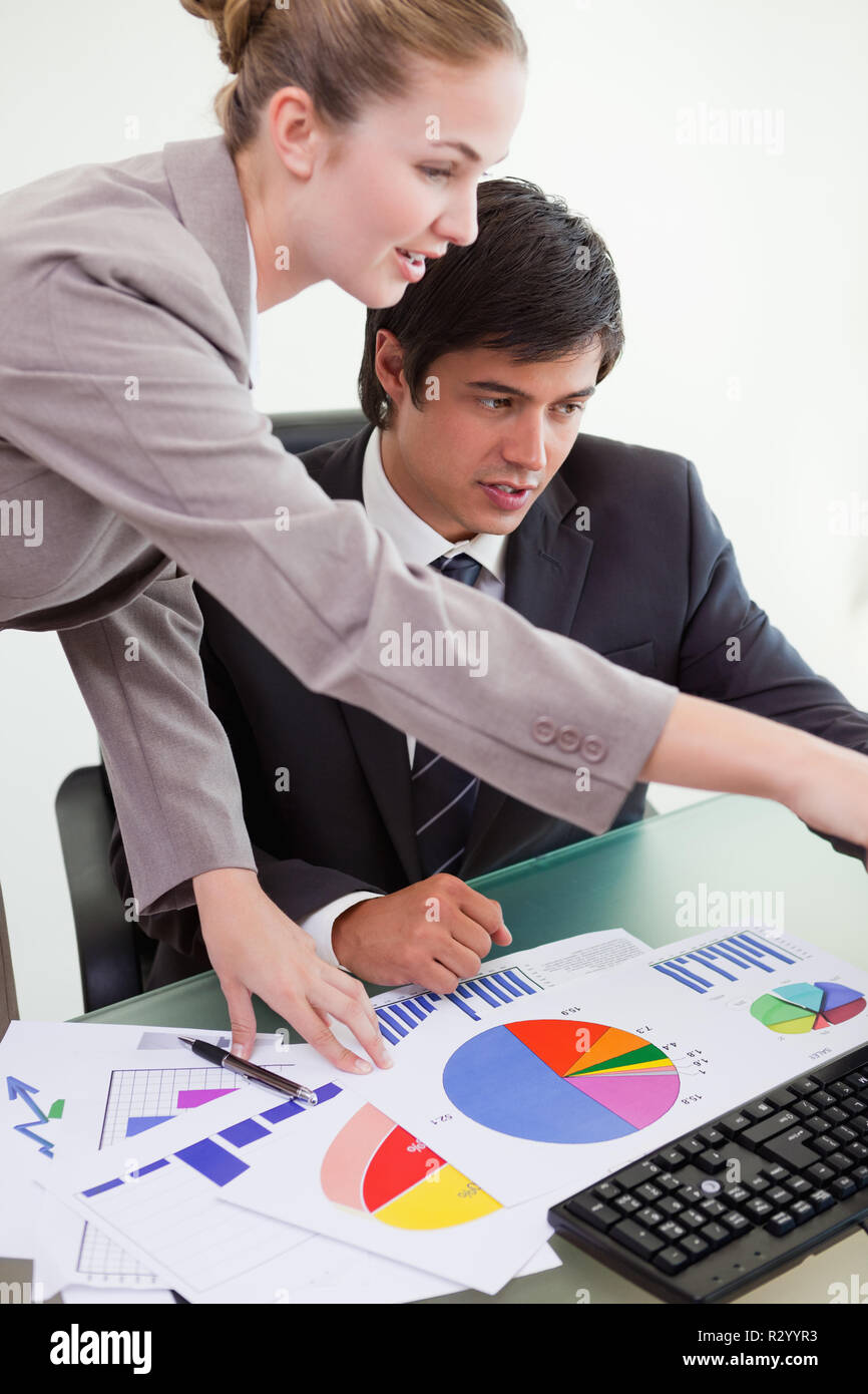 Busy office computers graphs hi-res stock photography and images - Alamy