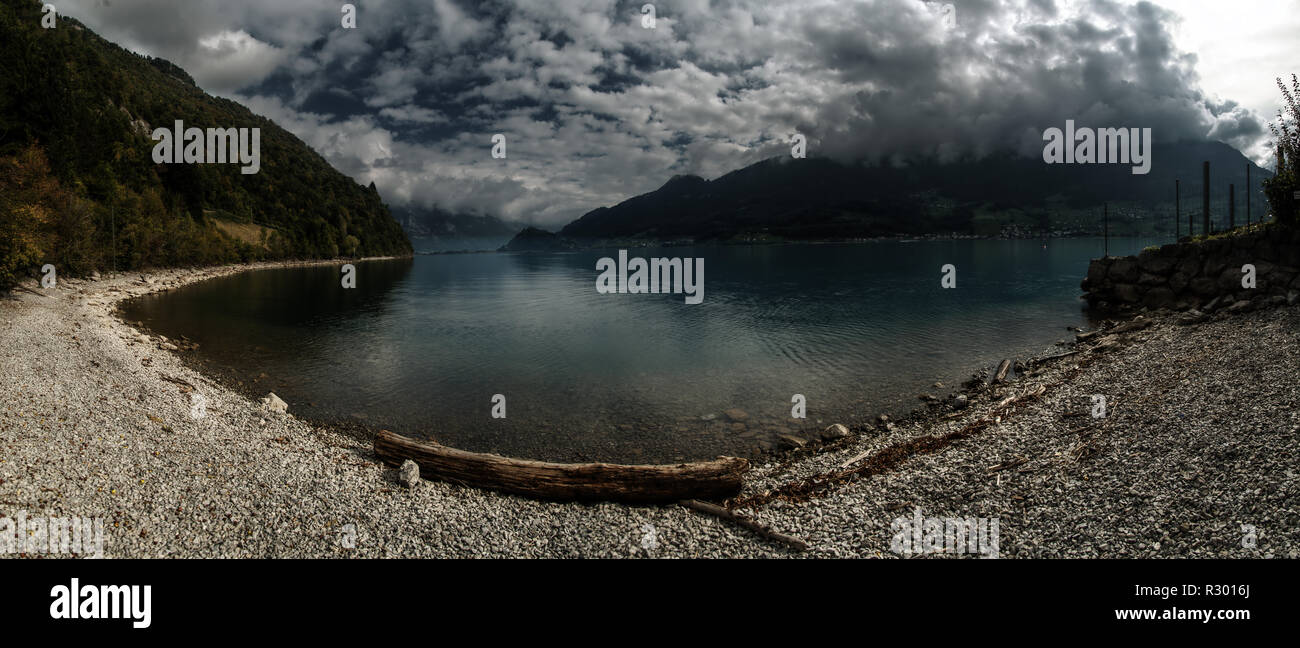 Shingle beach and moody ligh on the Walensee, seen from Quinten Stock ...