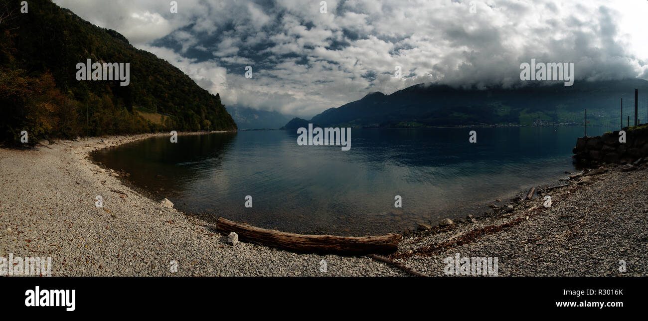 Shingle beach and moody ligh on the Walensee, seen from Quinten Stock ...