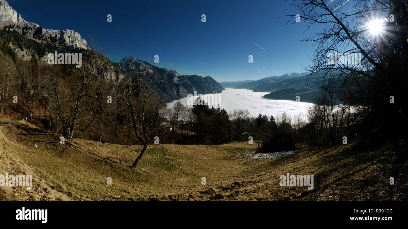 Cloud trapped under inversion, valley of Flums and Walenstadt, Swiss ...