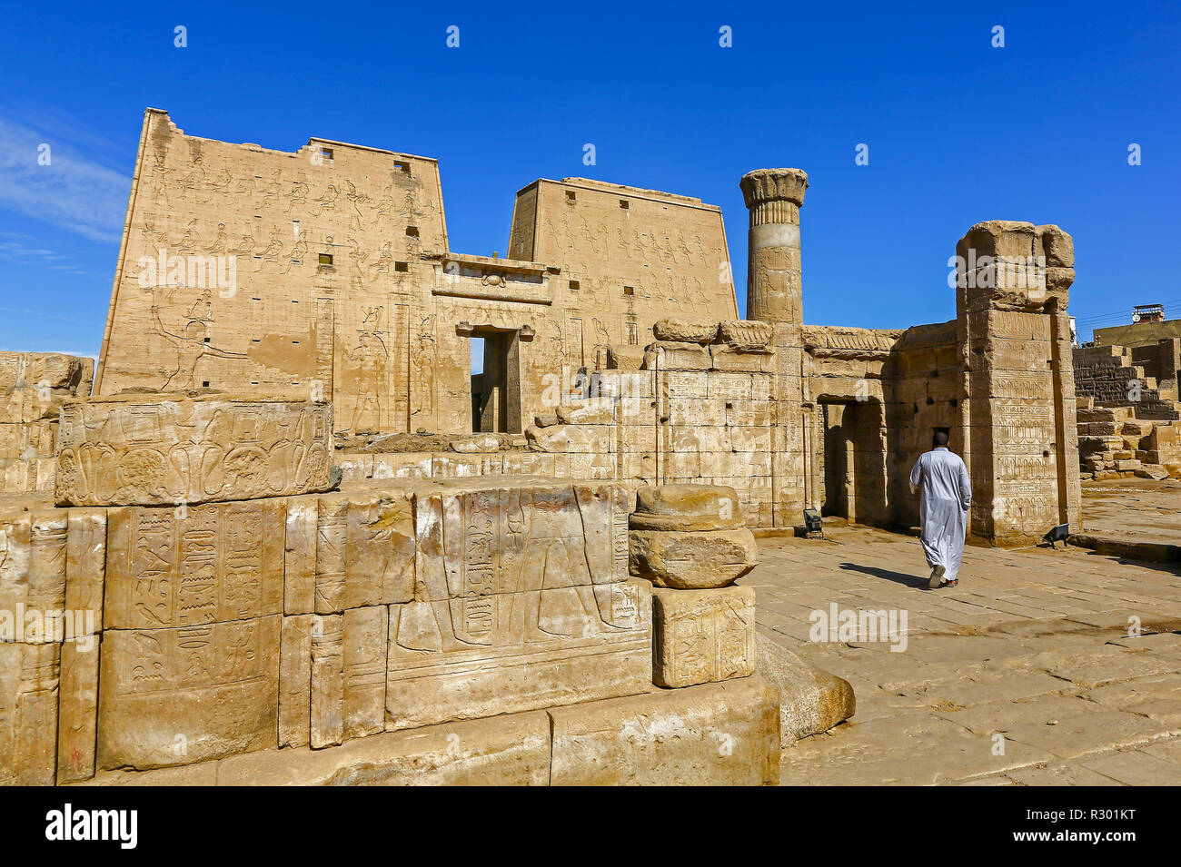 An Arab Man Walking Towards The Entrance Of The Temple Of Edfu An Egyptian Temple Located On 7096
