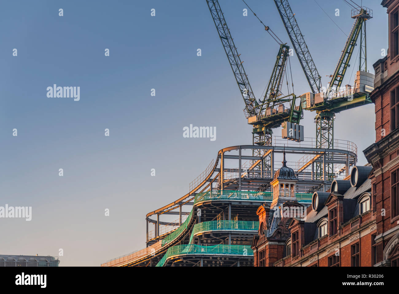 Two tower cranes during the construction of 100 Liverpool Street ...