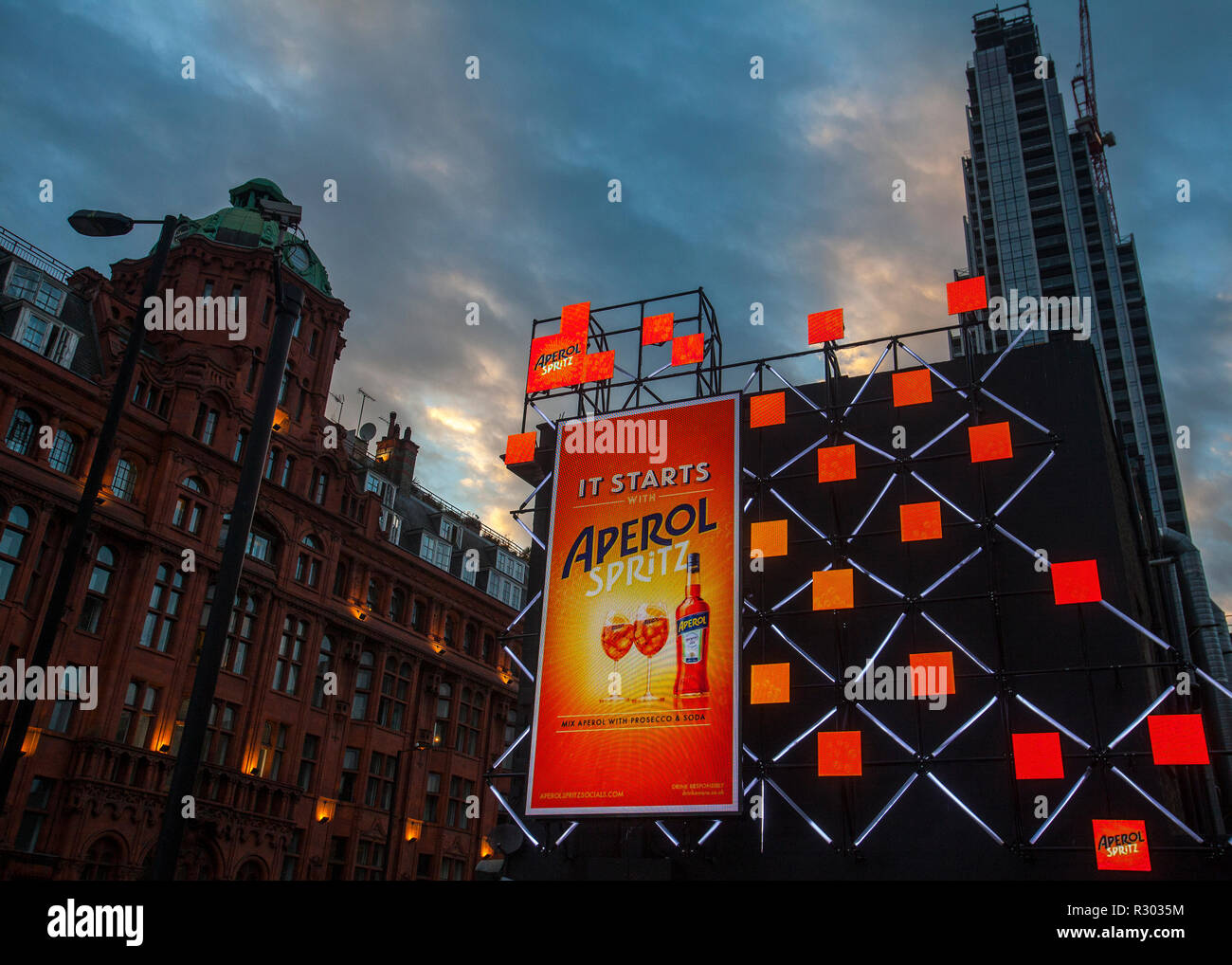 Aperol spritz neon advertising board on old street, London Stock Photo ...