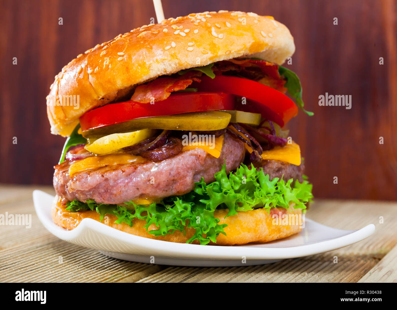 Appetizing double cheeseburger with two grilled beef patties and bacon ...