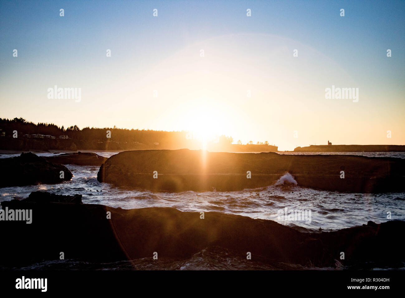 Sunset Bay State Park lives up to it's name as the setting sun casts a ...