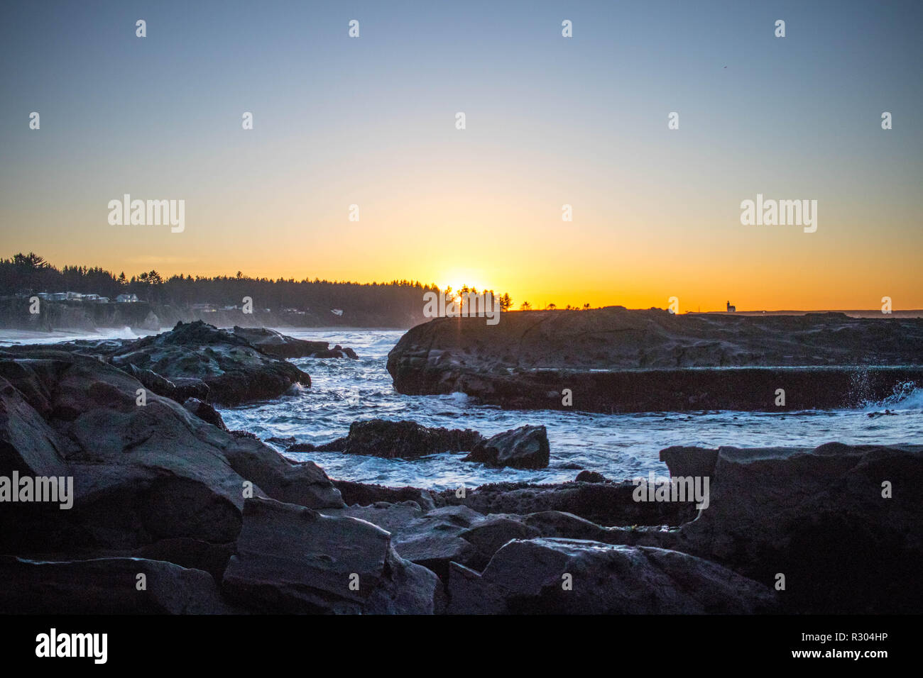 Sunset Bay State Park lives up to it's name as the setting sun casts a ...