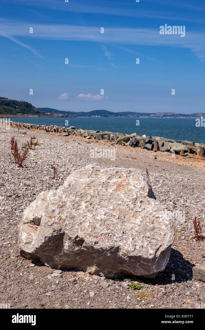 Boulders sea defence on beach at Llandulas North Wales UK Stock Photo ...