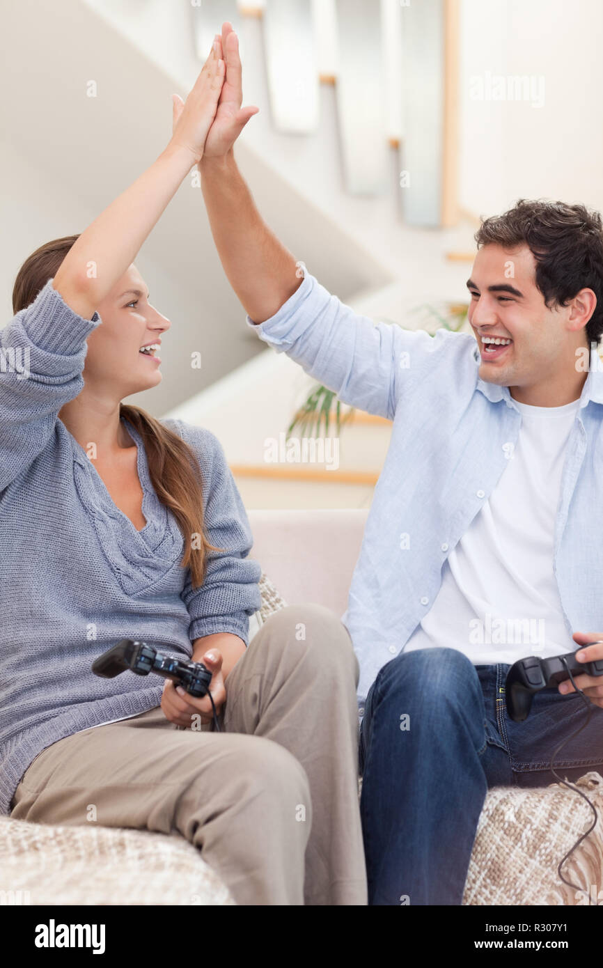 Partner remote control tv fight hi-res stock photography and images - Alamy