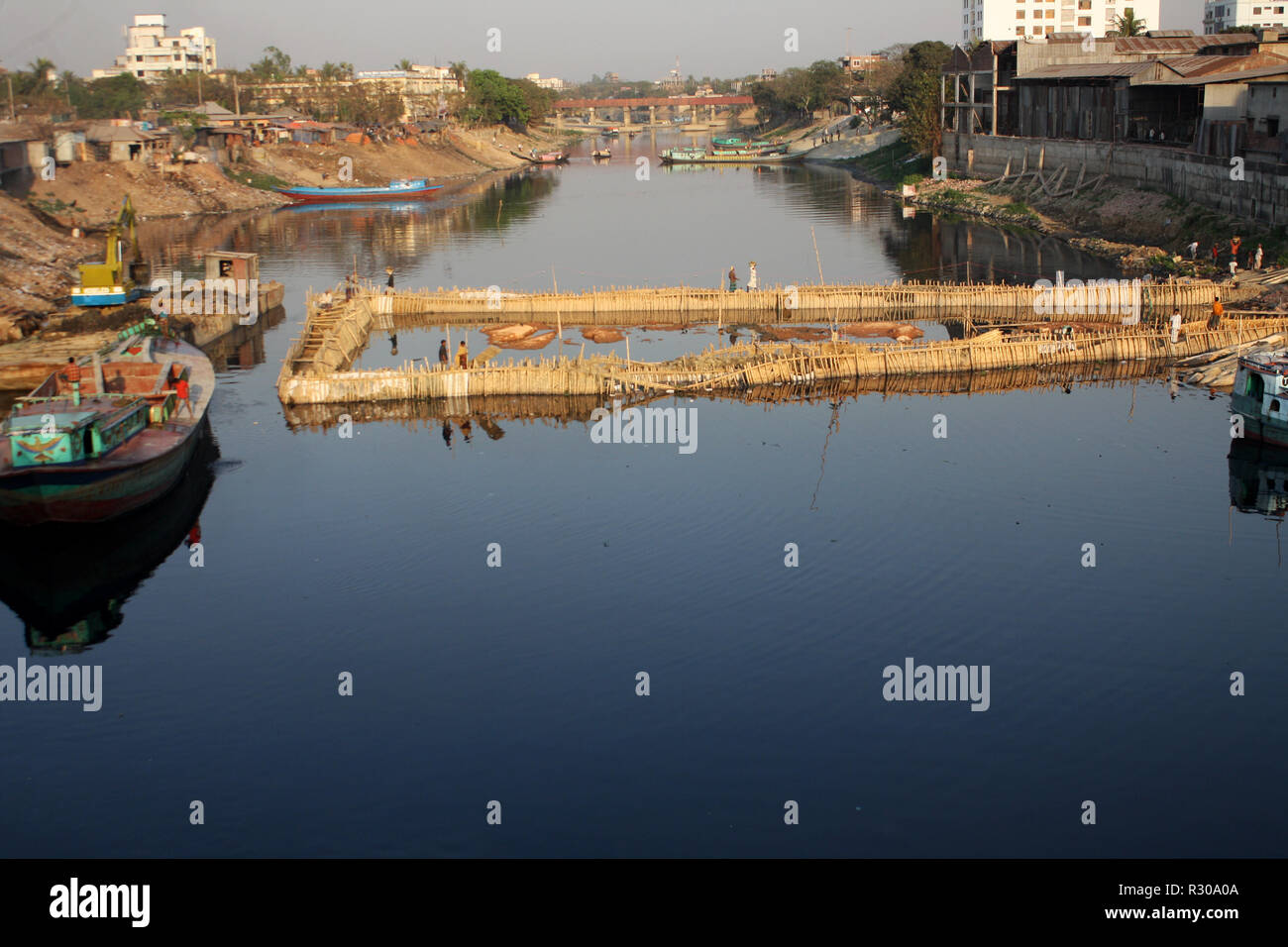 Boats on the polluted Water in Turag River in Dhaka, Bangladesh Stock ...