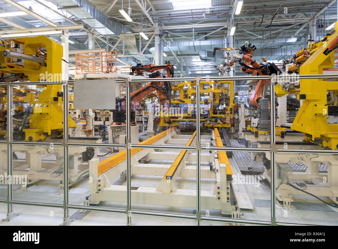 process of welding cars. Modern Assembly of cars at plant. automated ...
