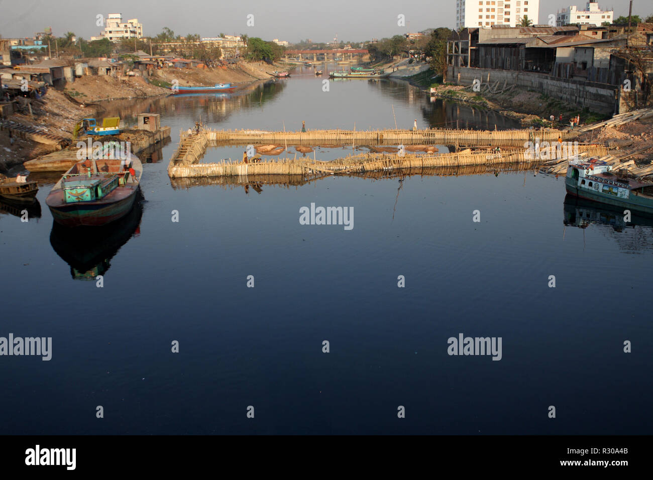 Boats on the polluted Water in Turag River in Dhaka, Bangladesh Stock ...
