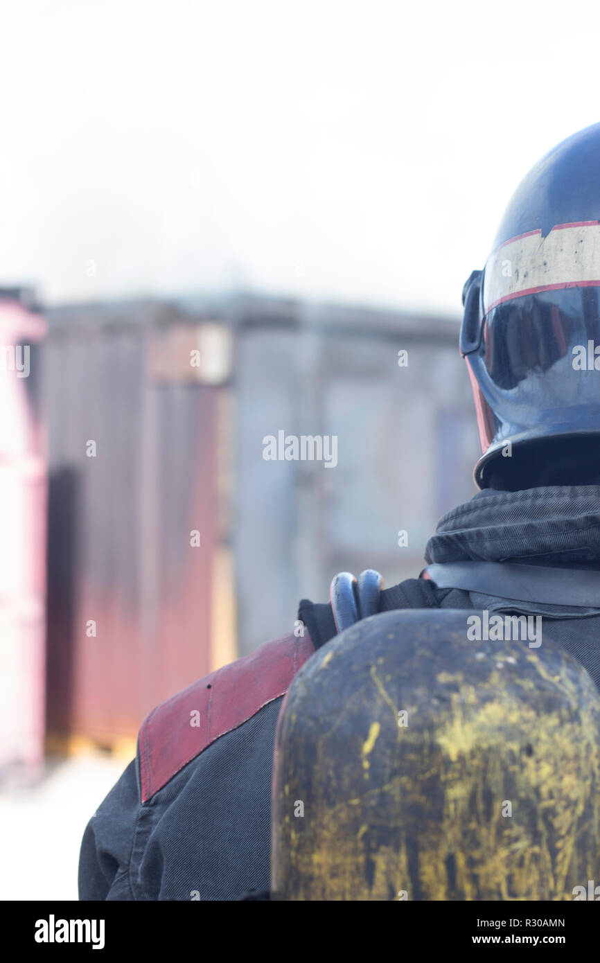 Firefighter putting out fire training station extinguisher backdraft ...