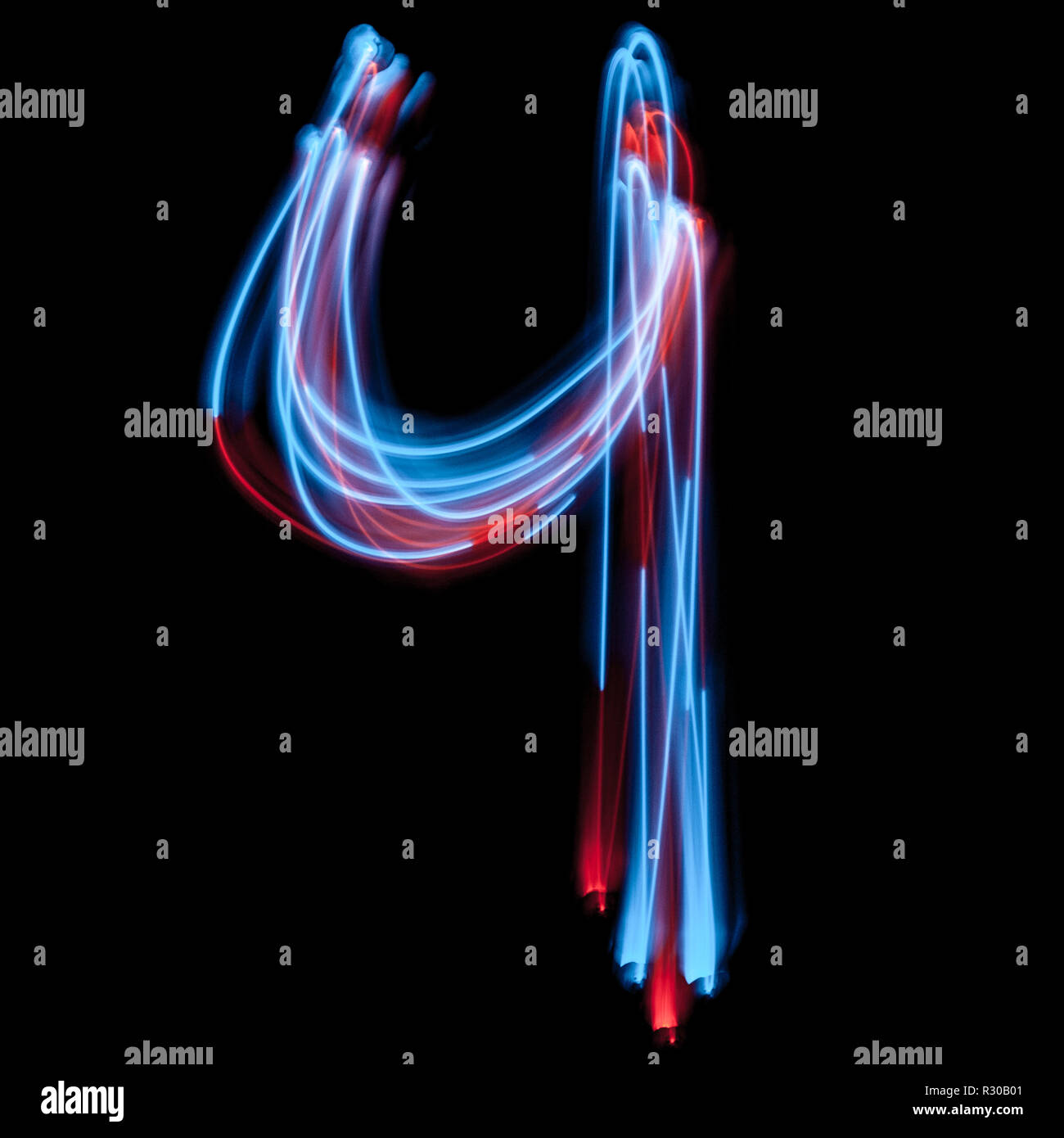 The neon number 4, blue light image, long exposure with colored fairy ...