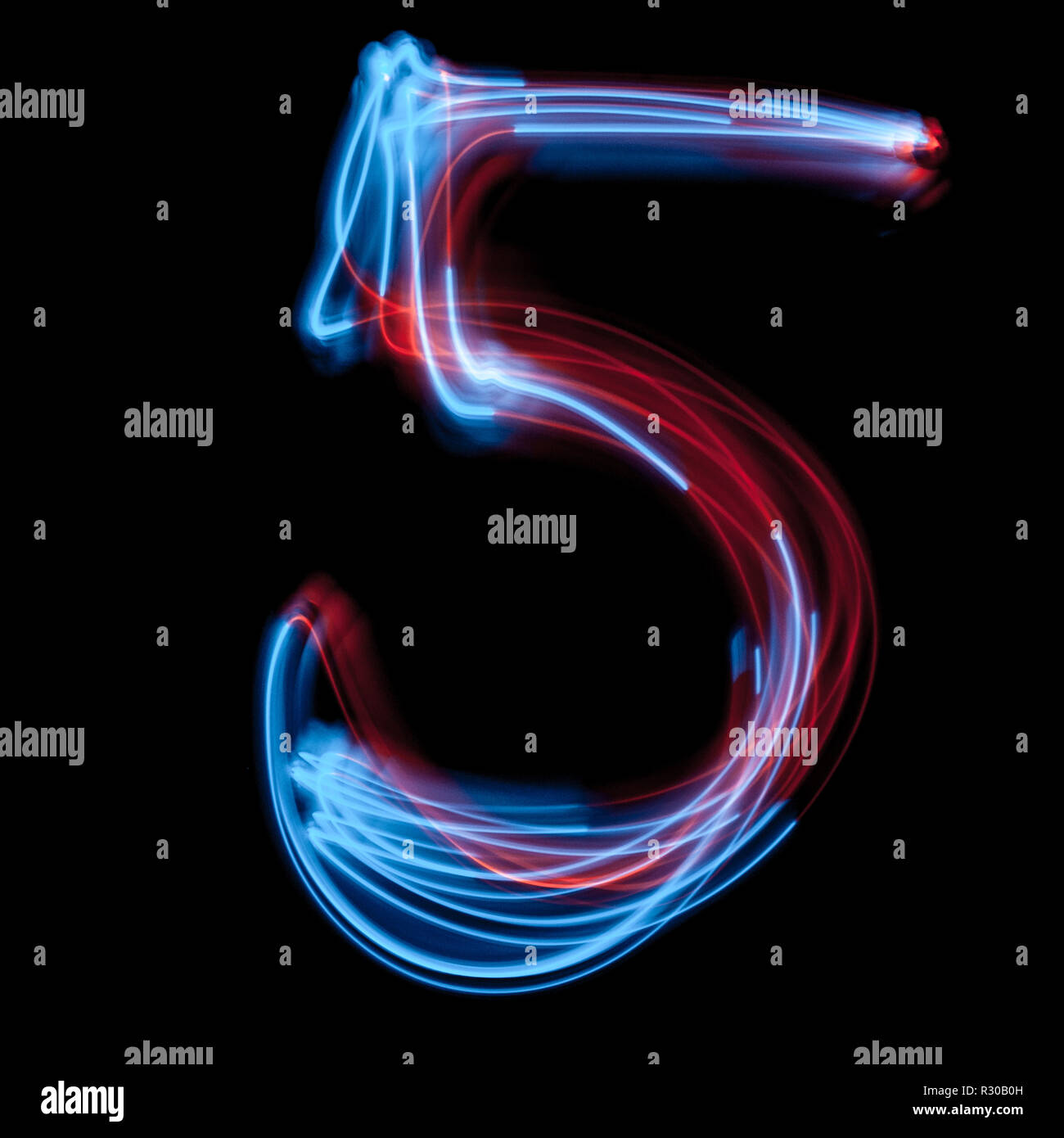 The neon number 5, blue light image, long exposure with colored fairy ...