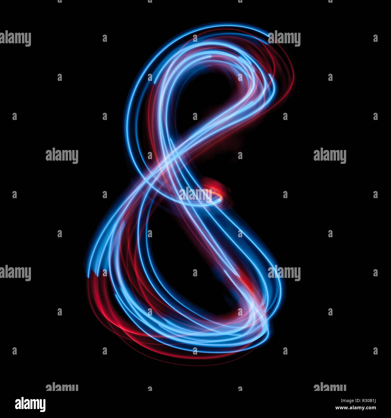 The neon number 8, blue light image, long exposure with colored fairy ...