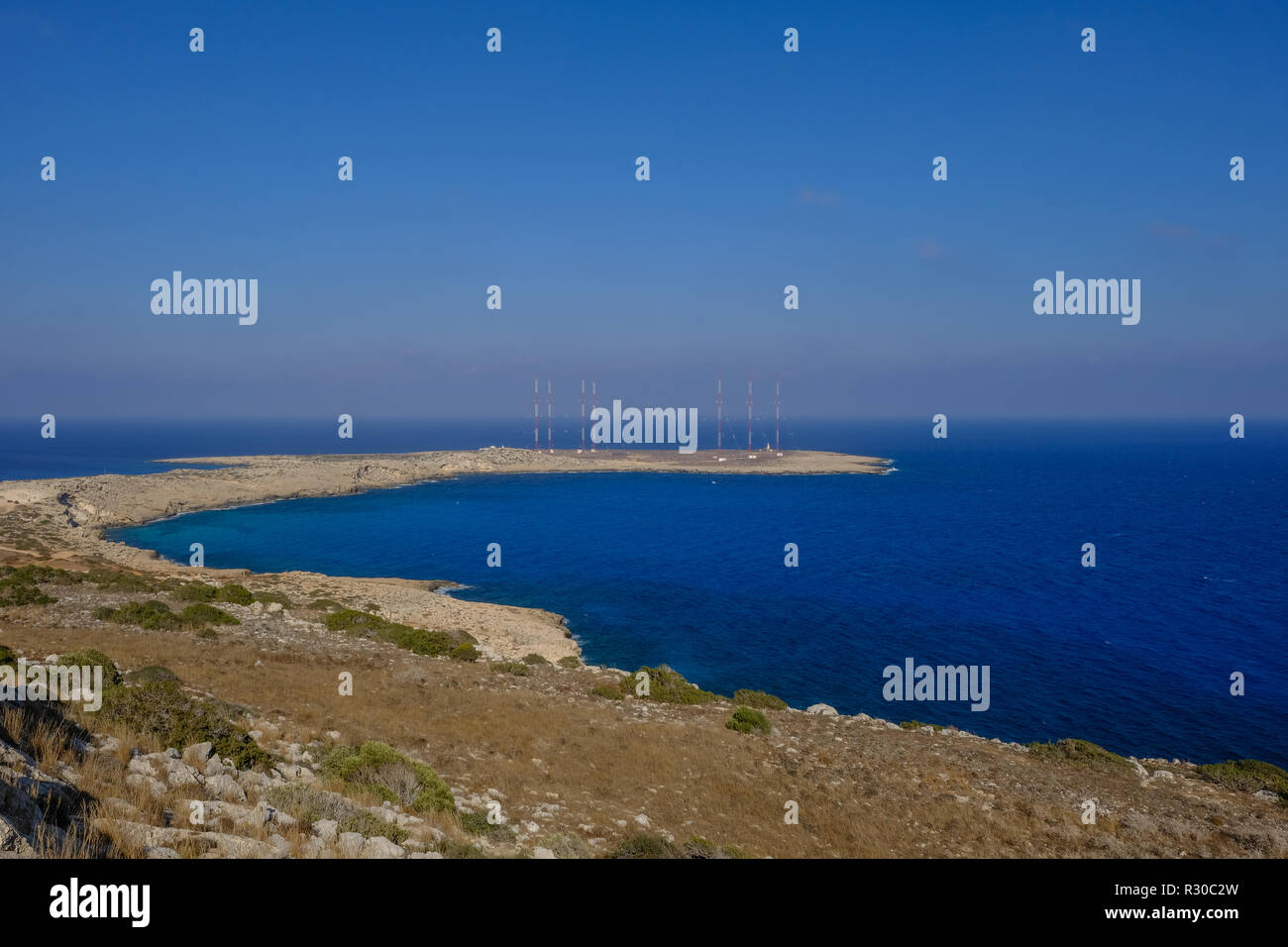 Aerial view of Cape Greco in Cyprus. Shows outcrop of land with masts ...