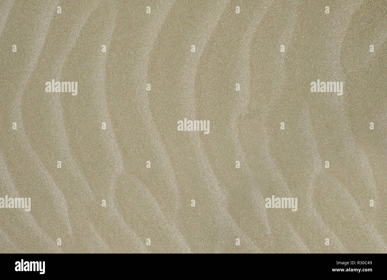 Natural sand pattern formation on a beach Stock Photo - Alamy