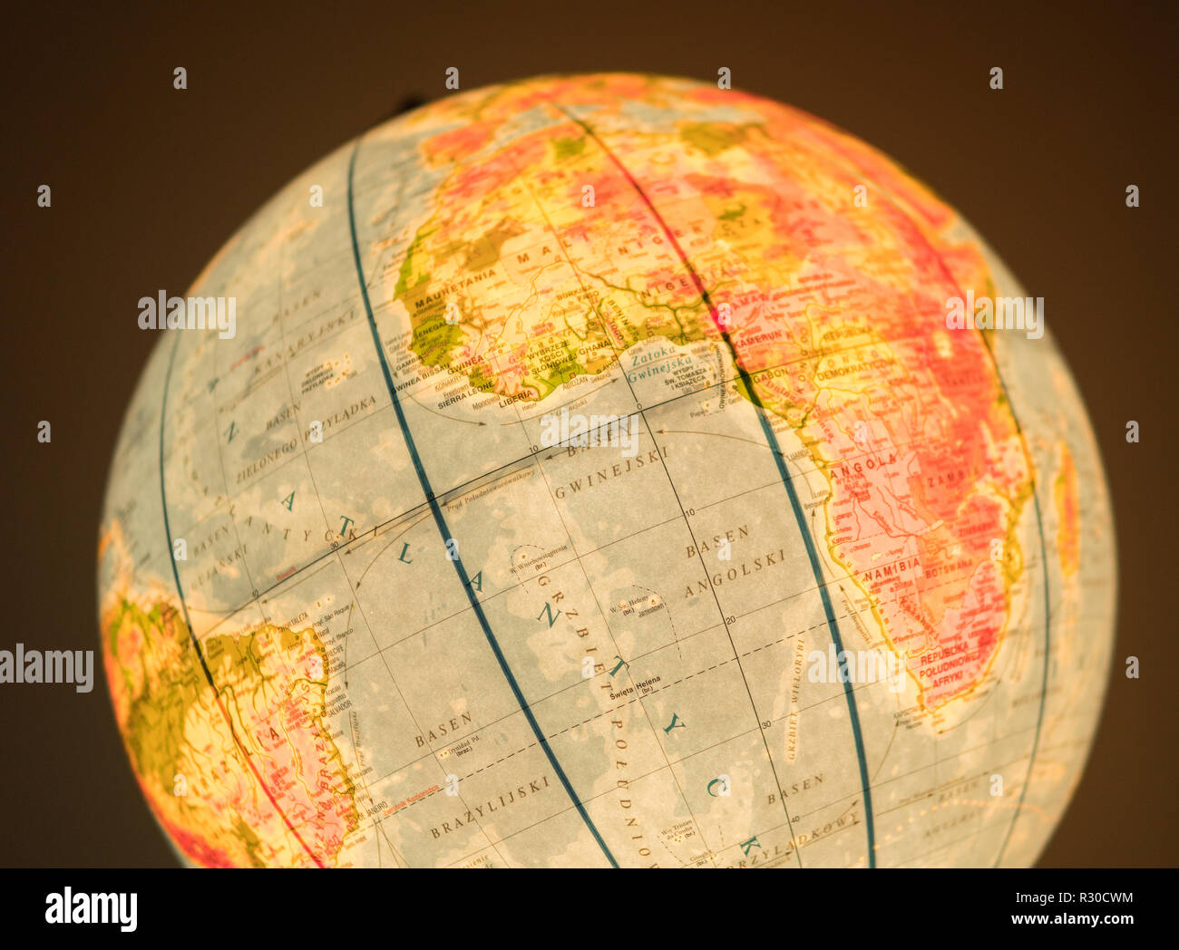 luminous globe model map isolated over dark backgroundf Stock Photo - Alamy