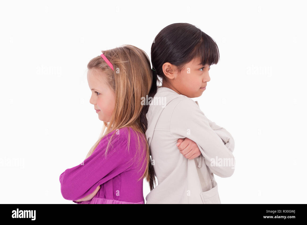 Sisters back back arms crossed hi-res stock photography and images - Alamy