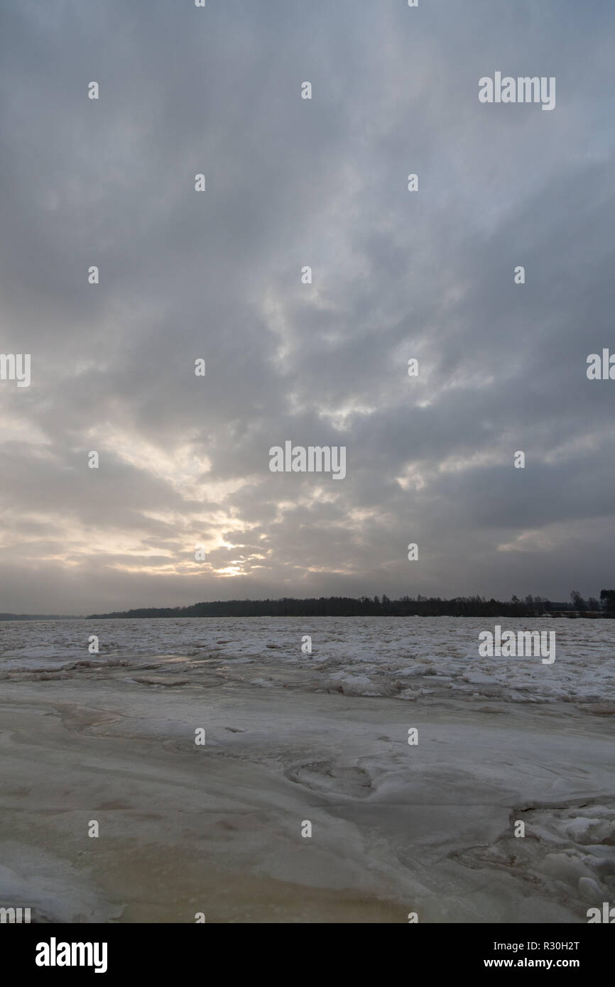 frozen sea side beach panorama in winter with lots of ice and snow in ...