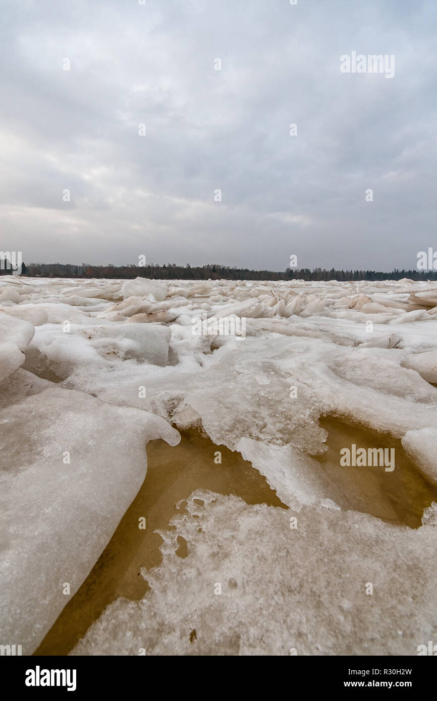 frozen sea side beach panorama in winter with lots of ice and snow in ...
